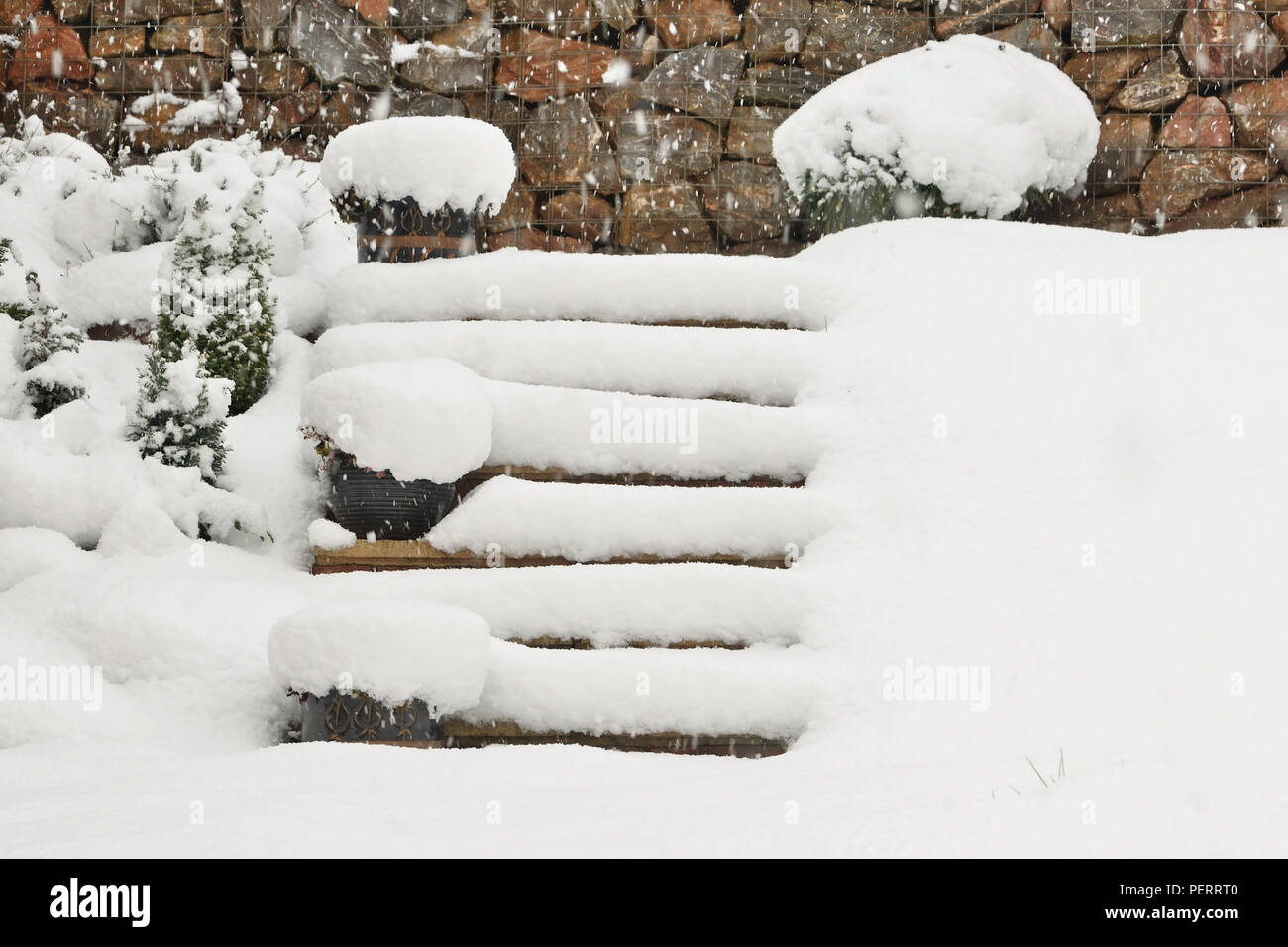 Snow-covered garden steps Stock Photo - Alamy