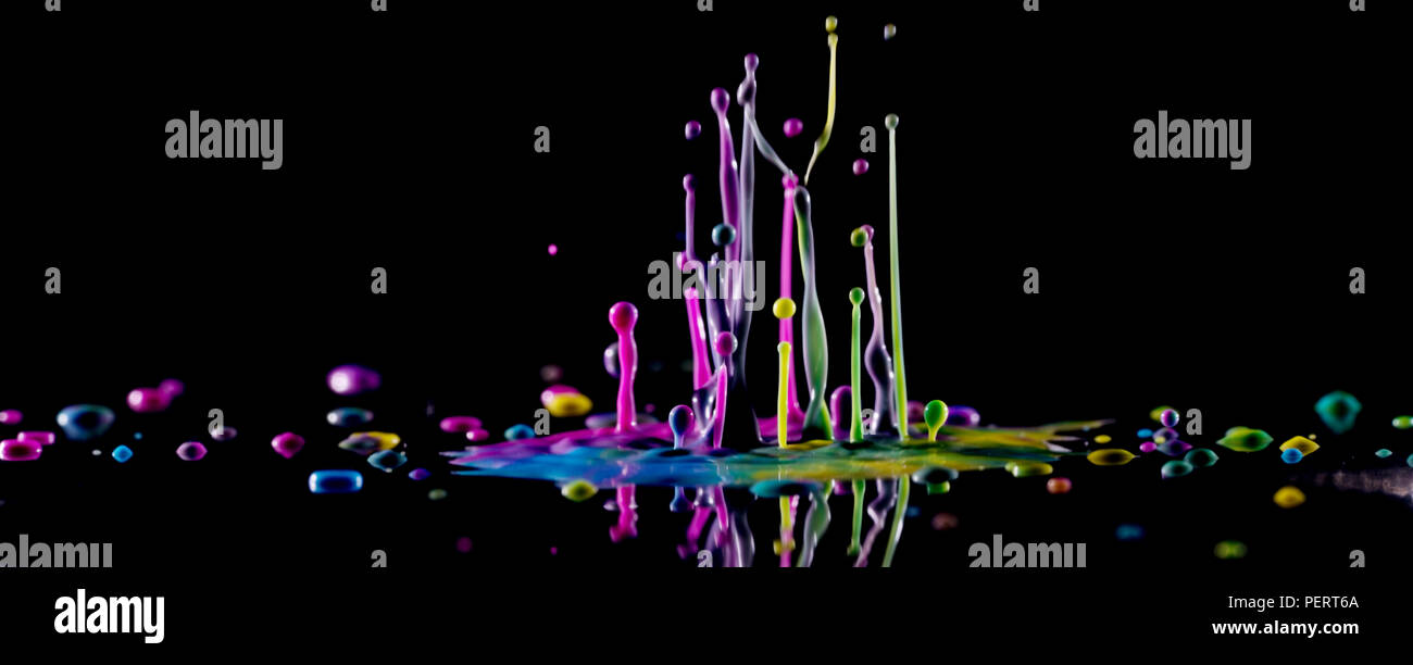 abstract color splash isolated on black background Stock Photo - Alamy