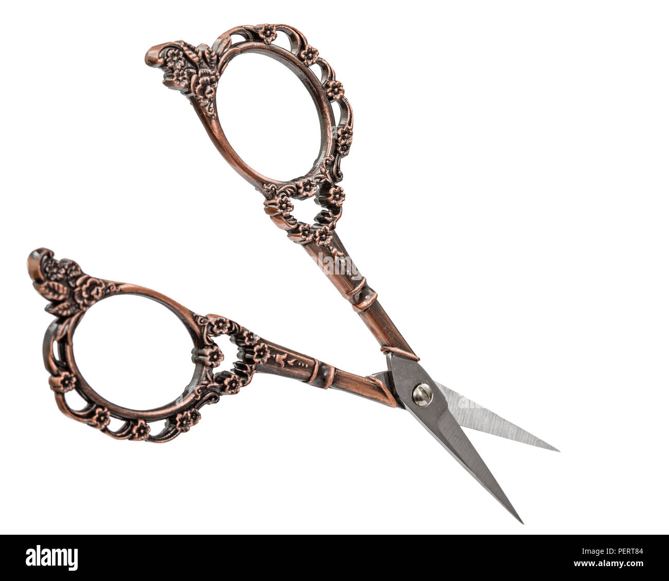 Scissors with curly handles from bronze, isolated on white background ...