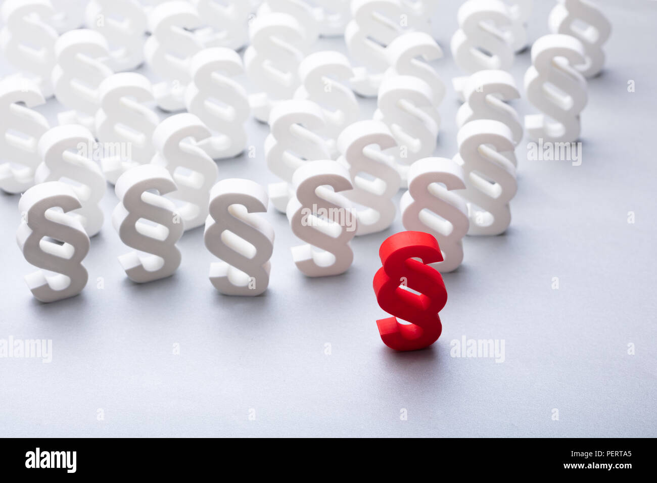 Red Paragraph Symbol Leading Others On Grey Background Stock Photo - Alamy