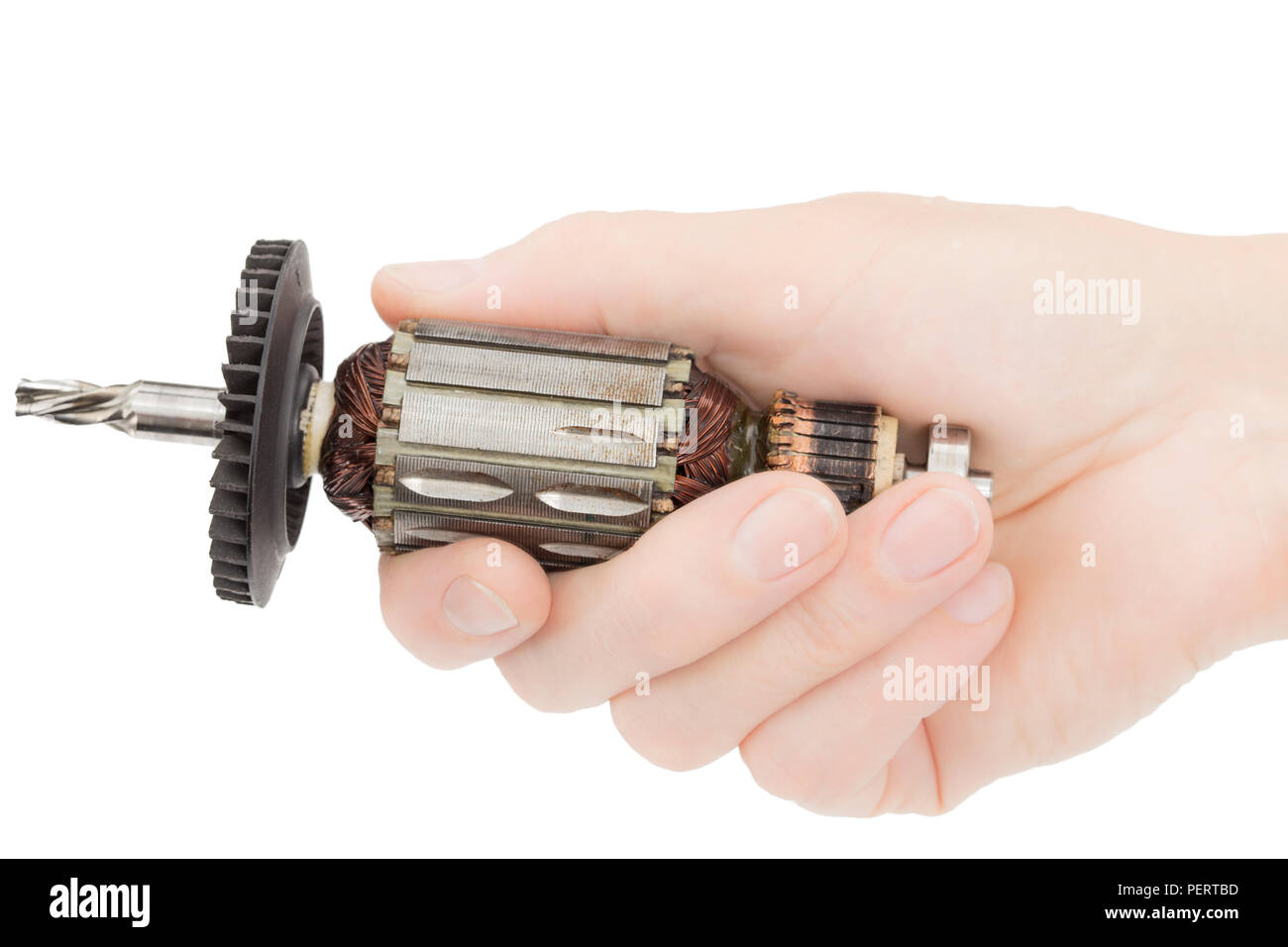 Female hand holds a pair of damaged electric motor anchor, isolated on ...