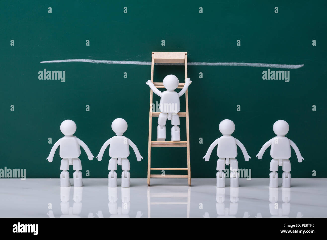 Human Figure Climbing Ladder To Reach Finish Line On Chalkboard Stock ...