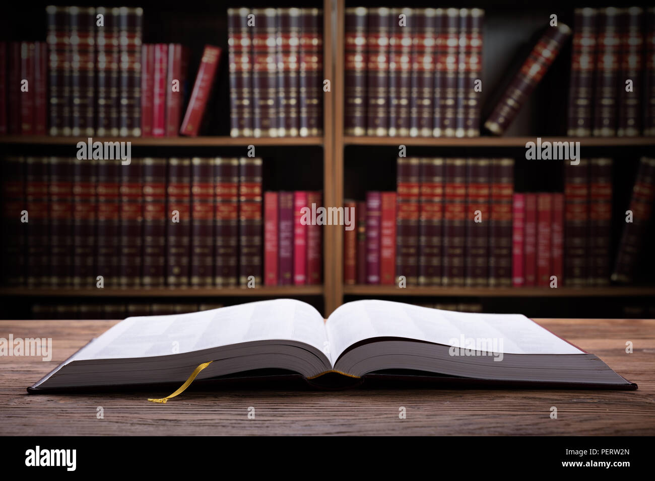 Close-up Of An Open Law Book On Wooden Desk In Courtroom Stock Photo ...