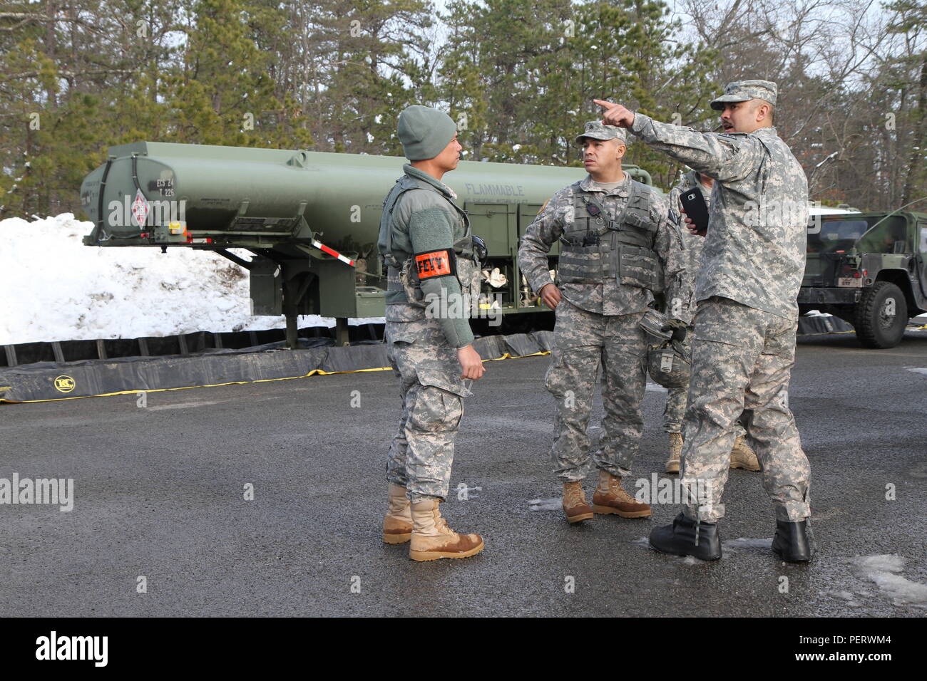 U.S. Army (from left to right) Sgt. Angelo Delosreyes and Staff Sgt ...