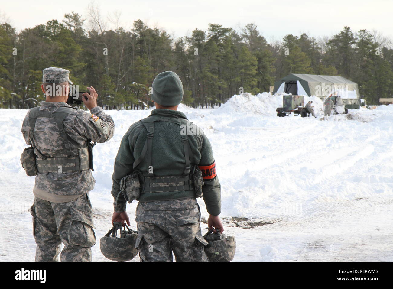 U.S. Army Staff Sgt. Carlos Meza and Sgt. Angelo Delosreyes, of the ...