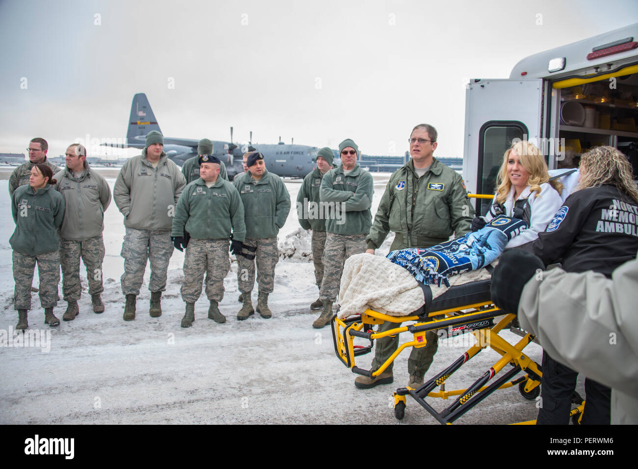 Staff Sgt. Taylor Savage is greeted by nearly 100 members of the 133rd ...