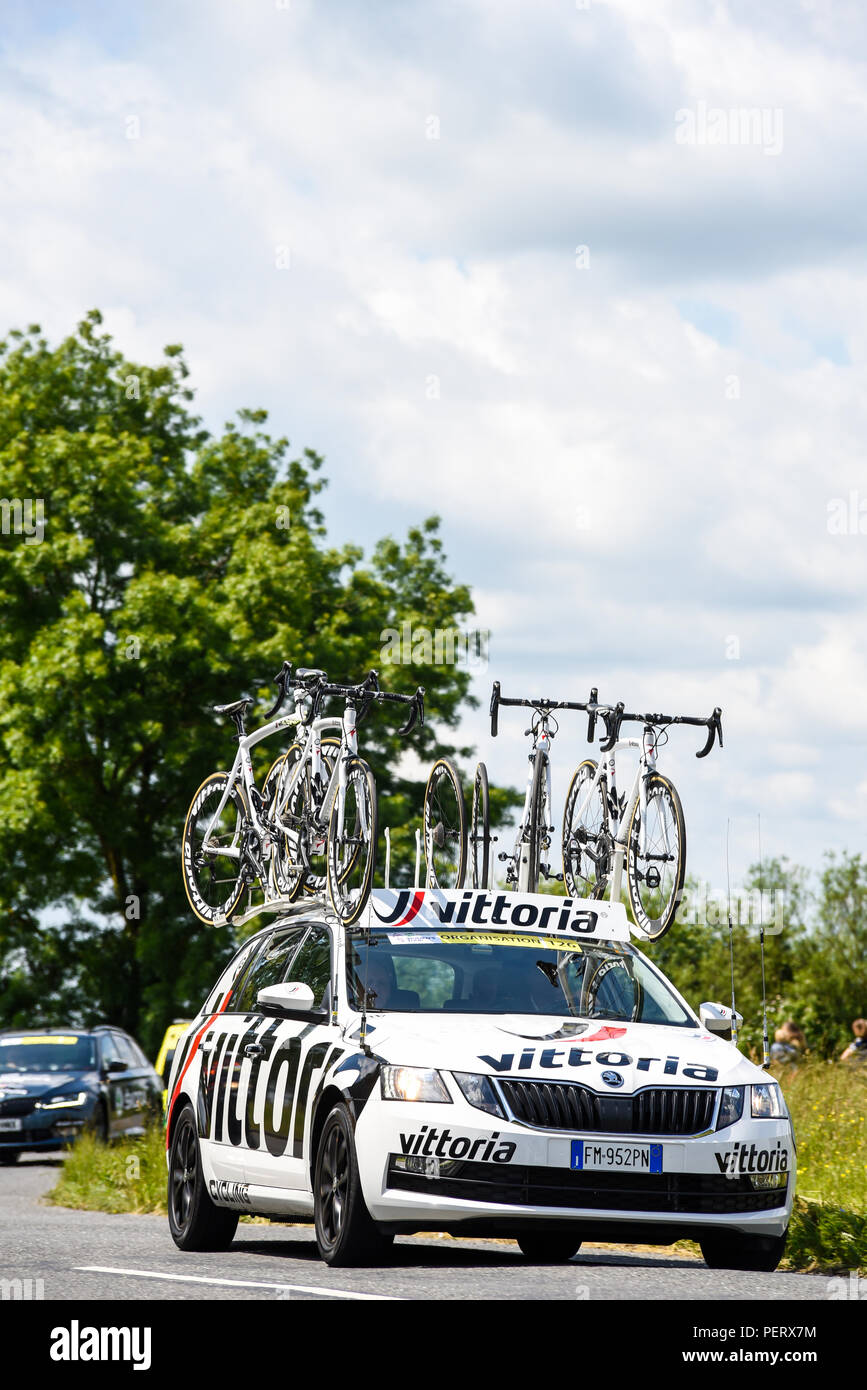 Vittoria Cycling support car passing through Saxtead, Suffolk, UK ...