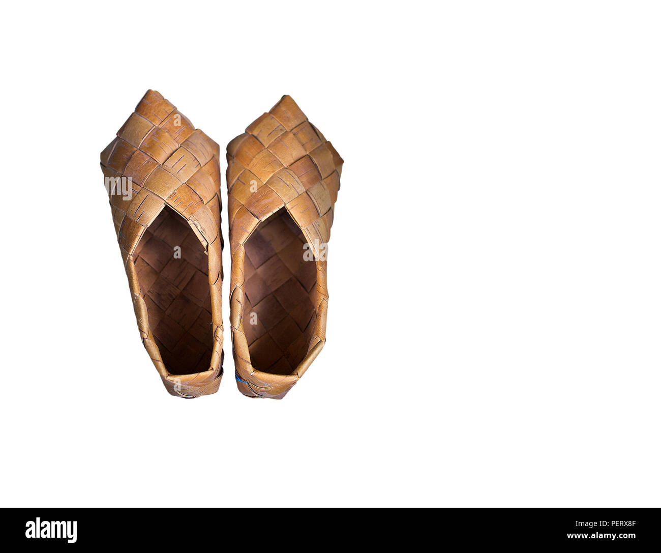 Birch bark shoes, or Swede shoes used in the 17th century, isolated on ...