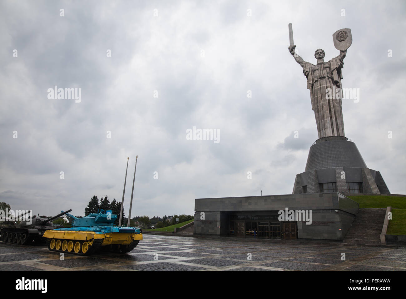 Soviet Motherhood statue with shield and sword, against a cloudy sky ...
