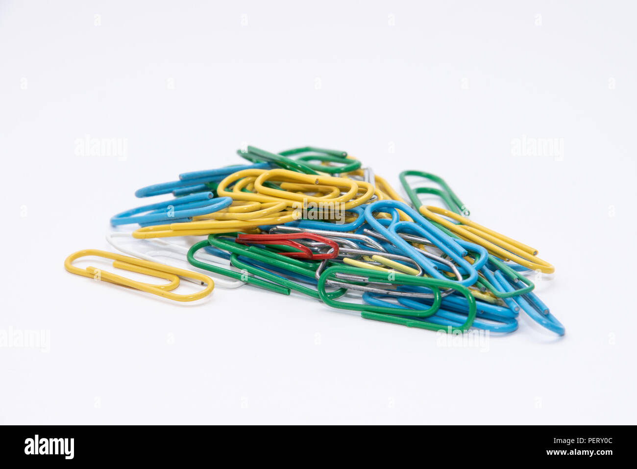 Paper clips in many different colors red blue green yellow Stock Photo ...