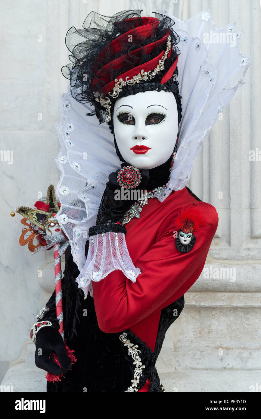Reveller In Traditional Elaborate Mask And Costume At Venice Carnival ...