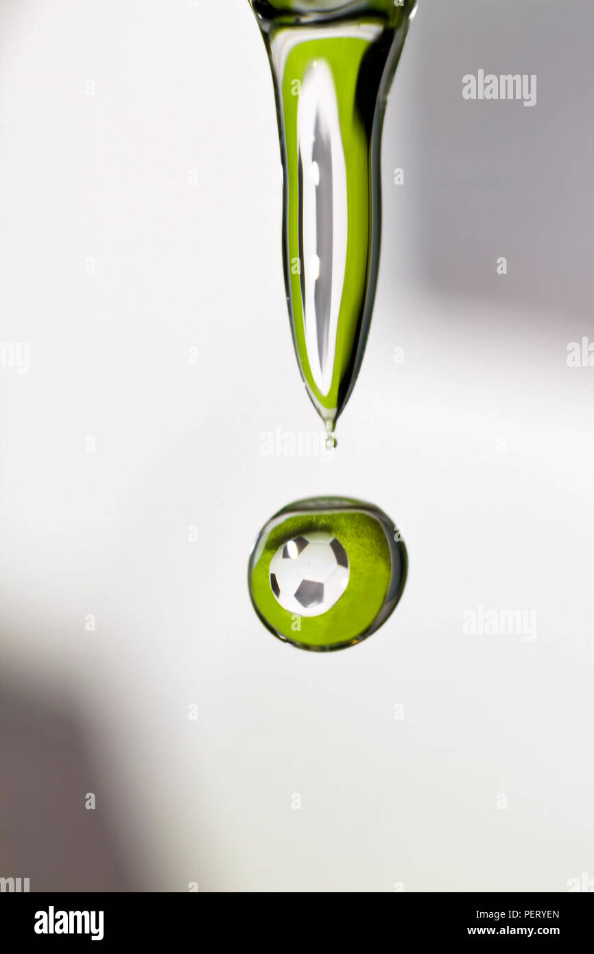Lightweight football. Drops of clear water with reflection of soccer ...