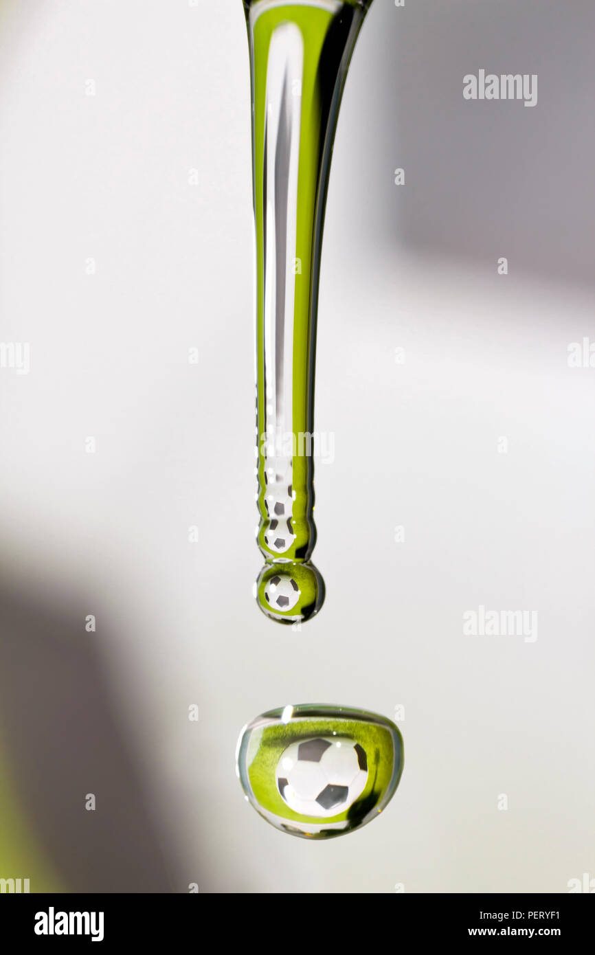 Lightweight football. Drops of clear water with reflection of soccer ...