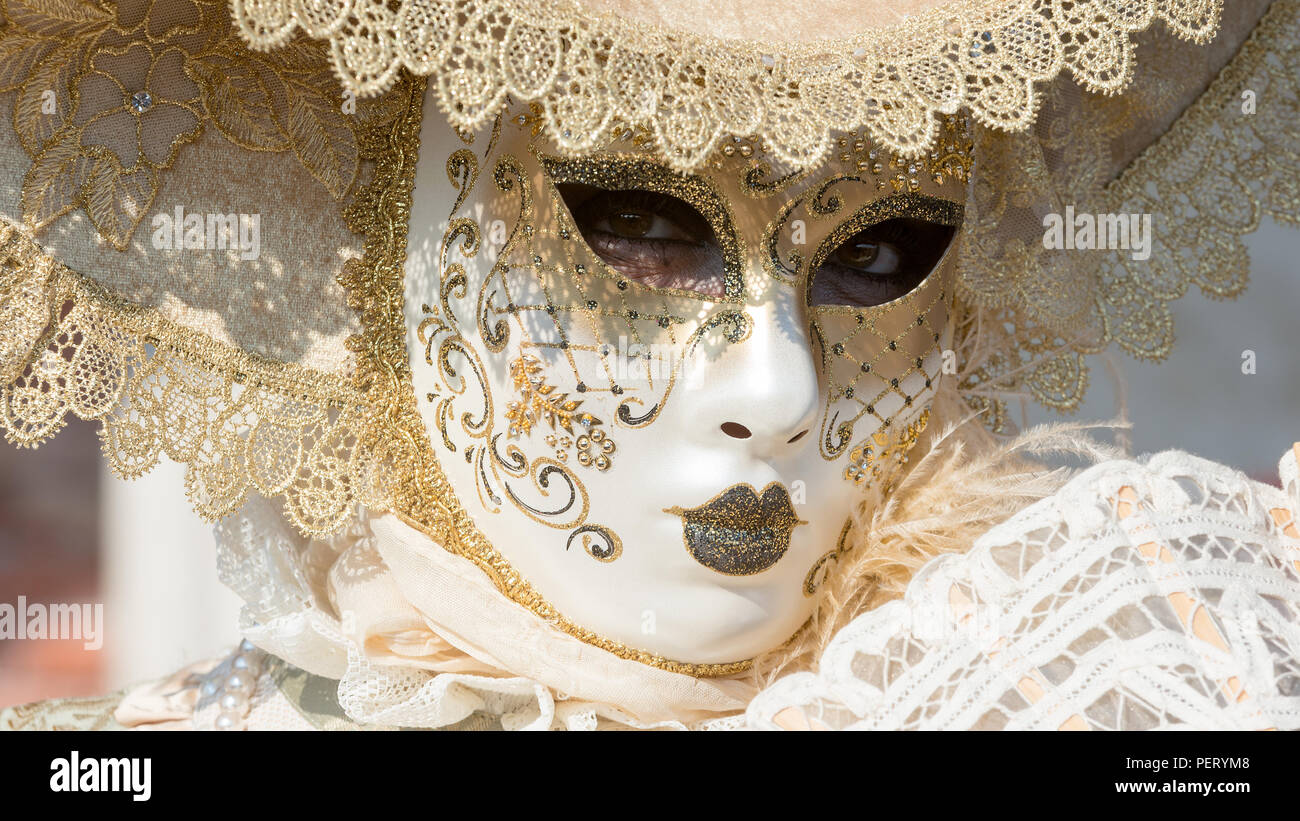Reveller In Traditional Elaborate Mask And Costume At Venice Carnival ...