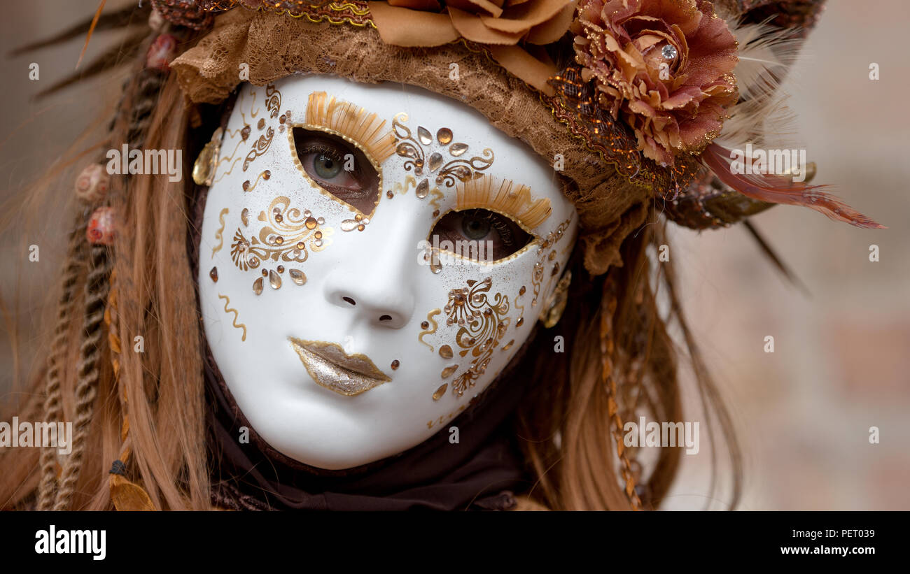 Reveller In Traditional Elaborate Mask And Costume At Venice Carnival ...