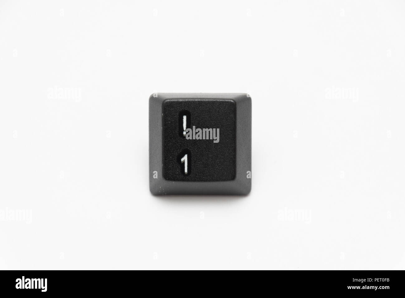 Single black keys of keyboard with different letters Stock Photo - Alamy