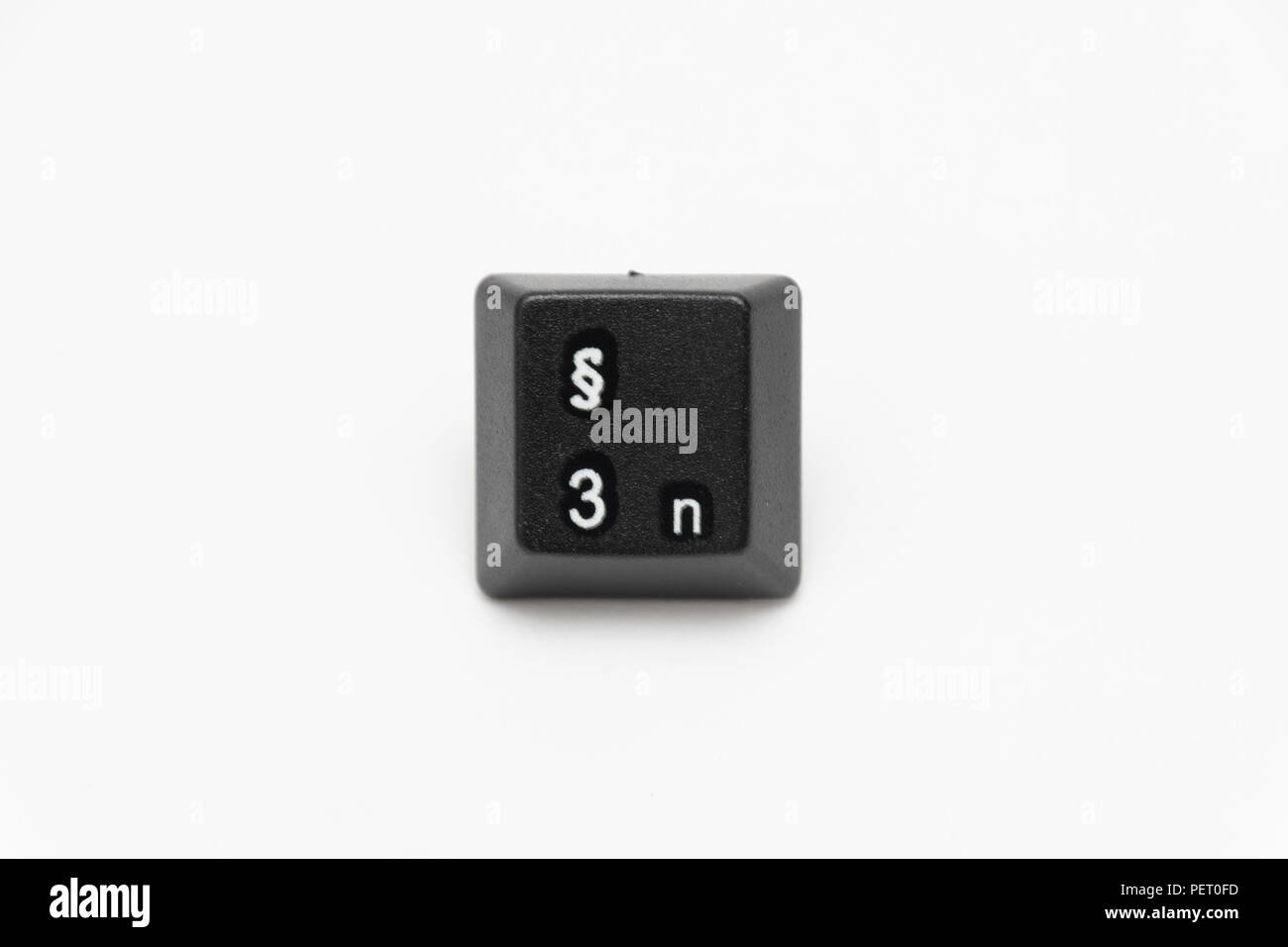 Single black keys of keyboard with different letters Stock Photo - Alamy