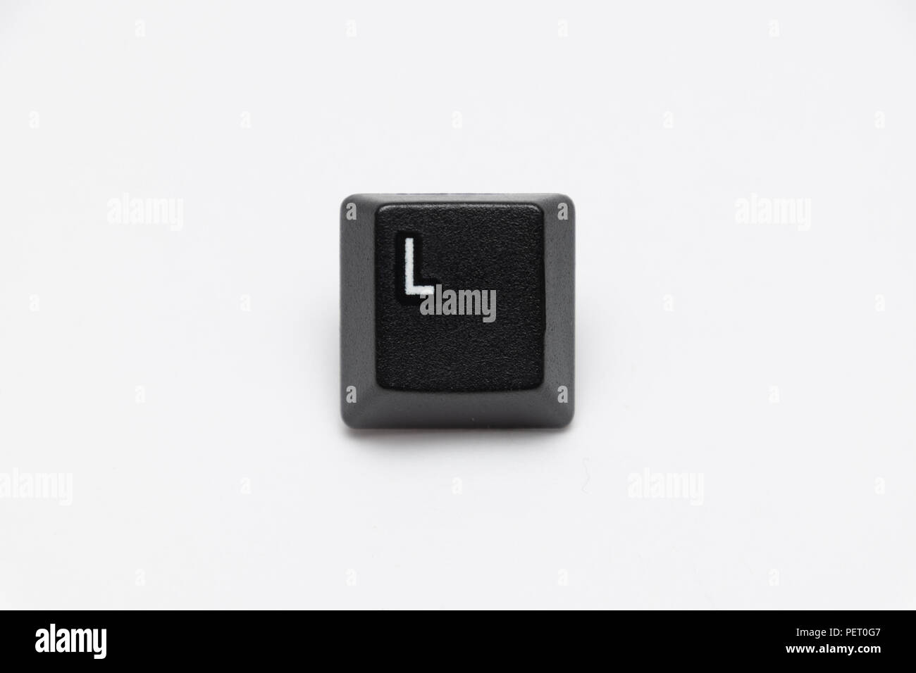 Single black keys of keyboard with different letters Stock Photo - Alamy