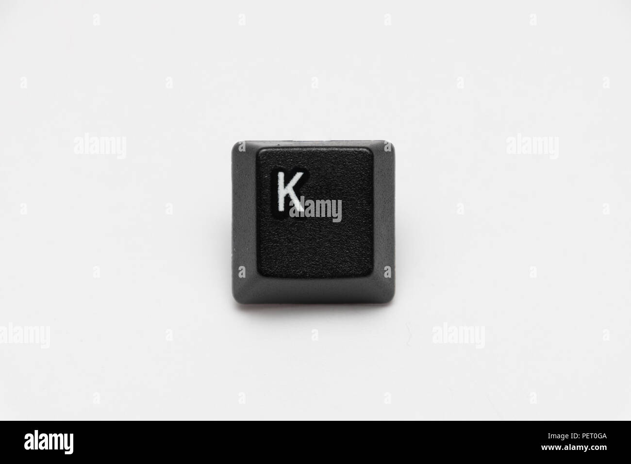 Single black keys of keyboard with different letters Stock Photo - Alamy