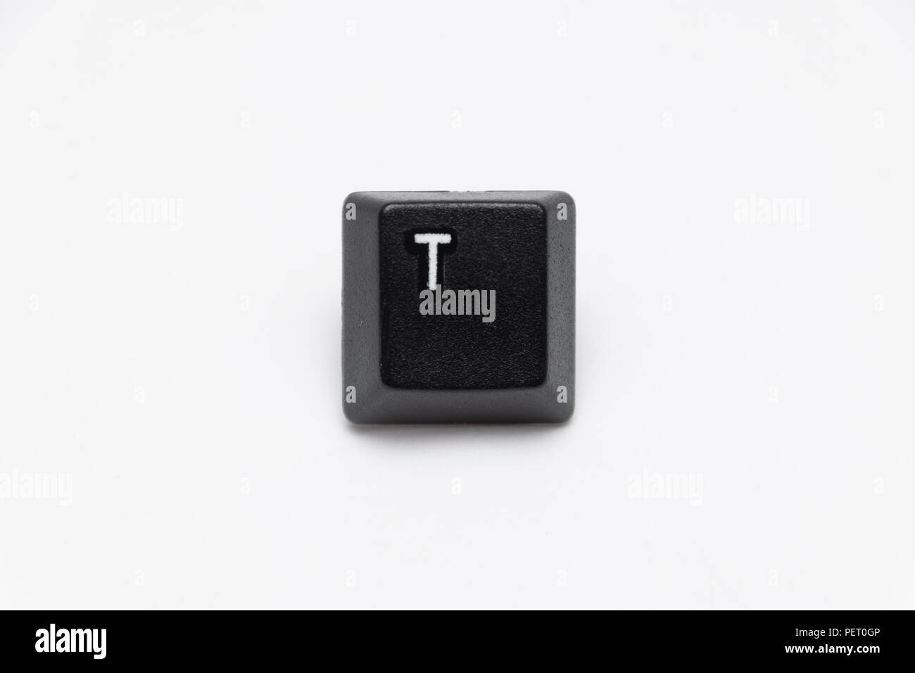 Single black keys of keyboard with different letters Stock Photo - Alamy