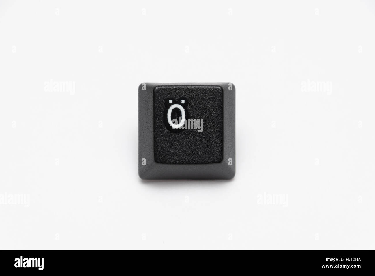 Single black keys of keyboard with different letters Stock Photo - Alamy