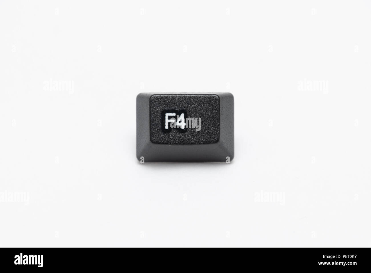 Single black keys of keyboard with different letters Stock Photo - Alamy