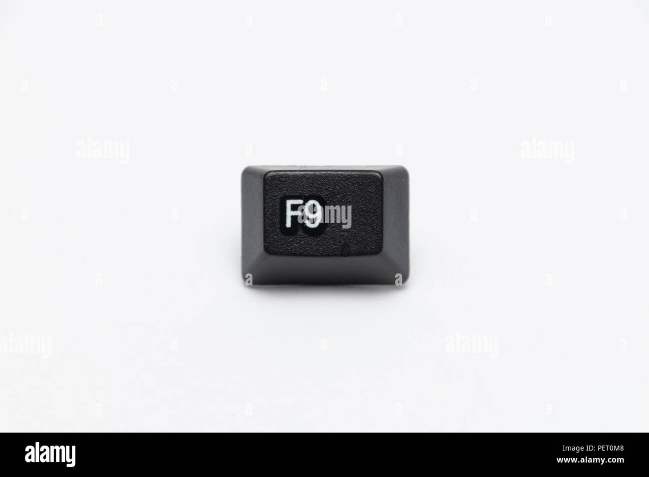 Single black keys of keyboard with different letters Stock Photo - Alamy
