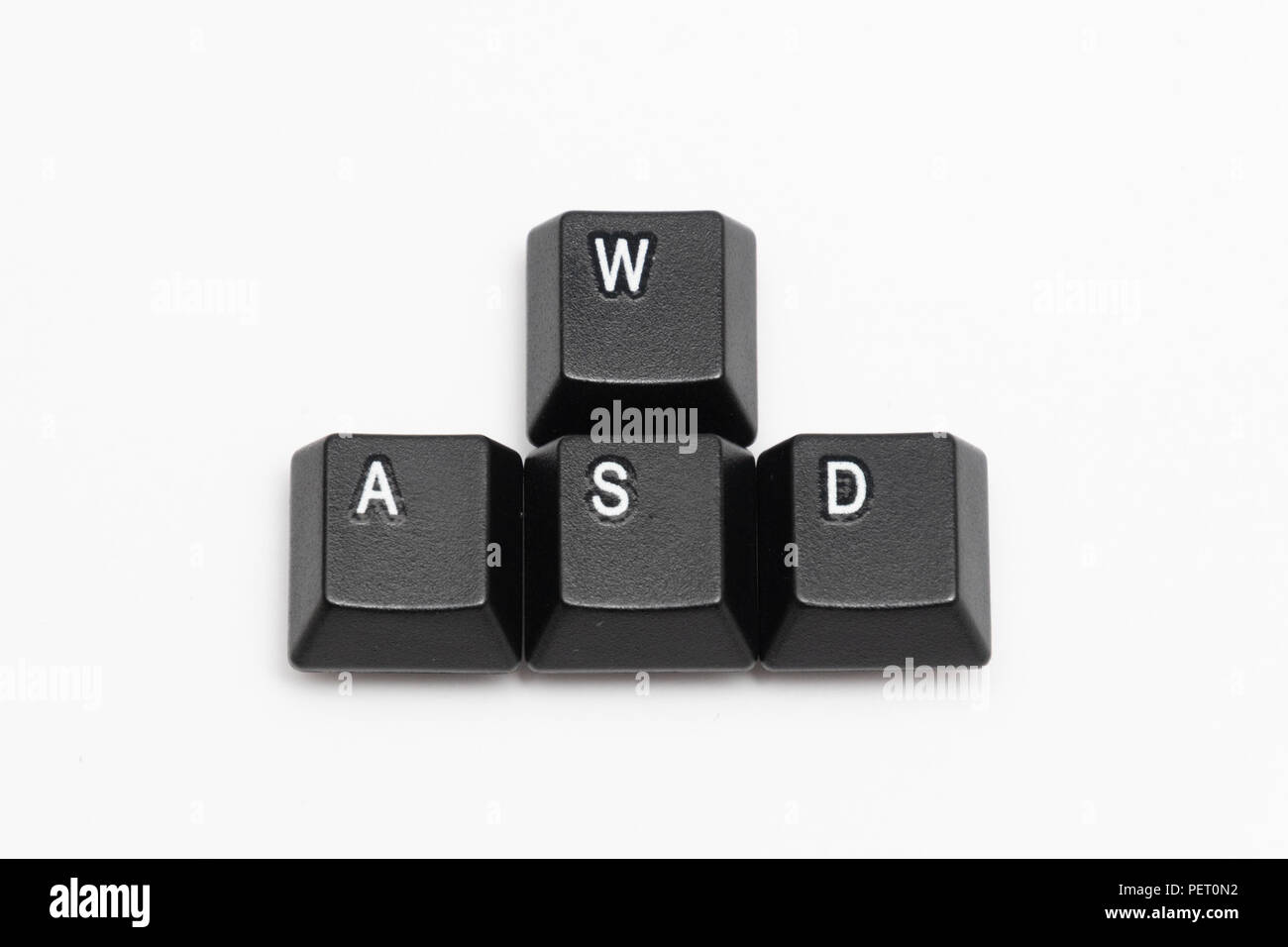Single black keys of keyboard with different letters Stock Photo - Alamy