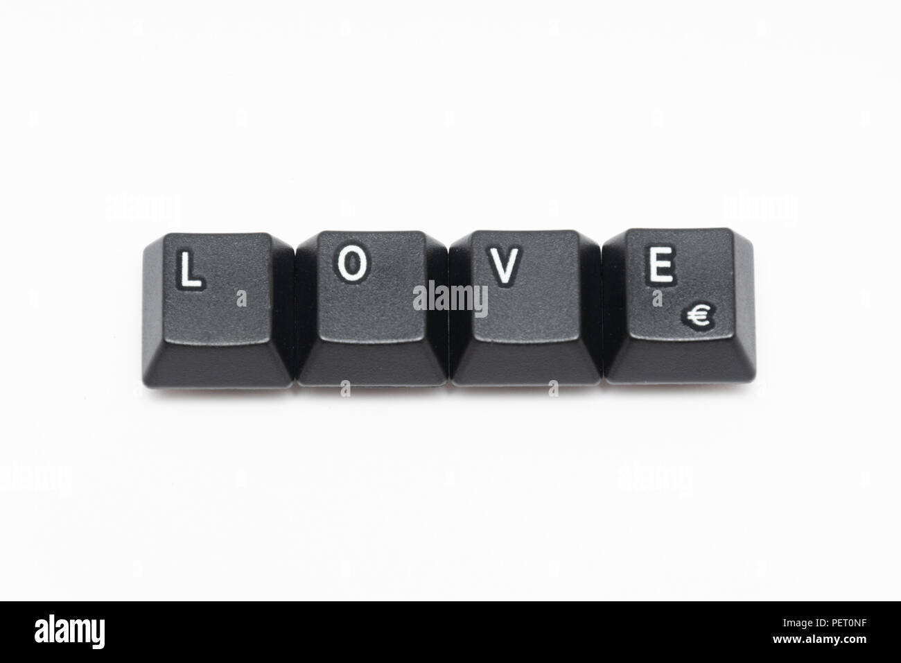 Single black keys of keyboard with different letters Stock Photo - Alamy