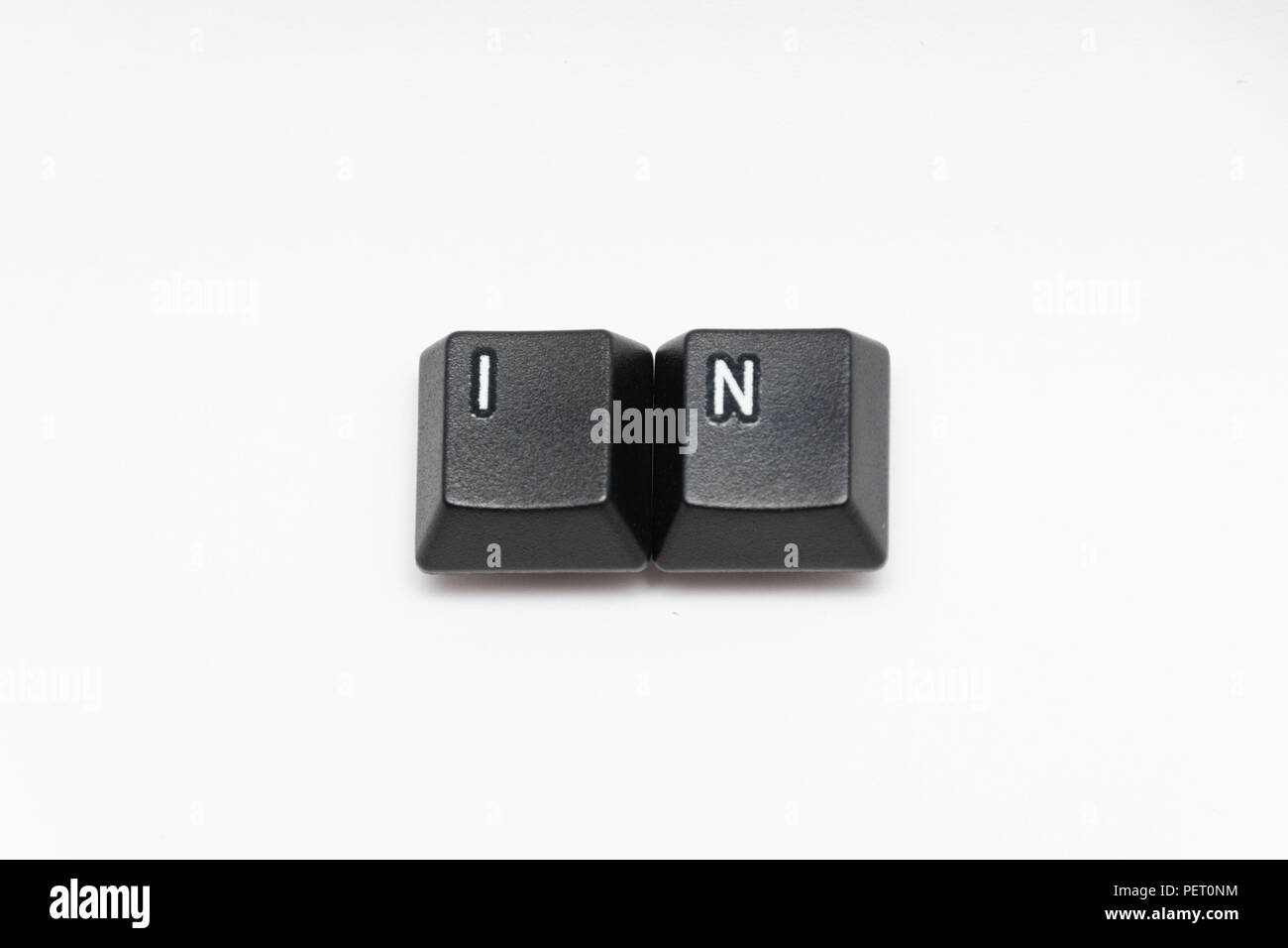Single black keys of keyboard with different letters Stock Photo - Alamy