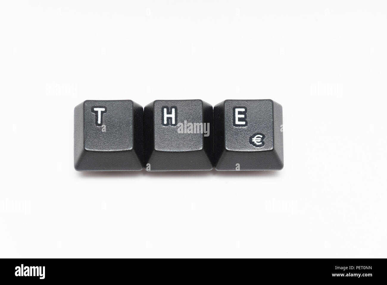 Single black keys of keyboard with different letters Stock Photo - Alamy