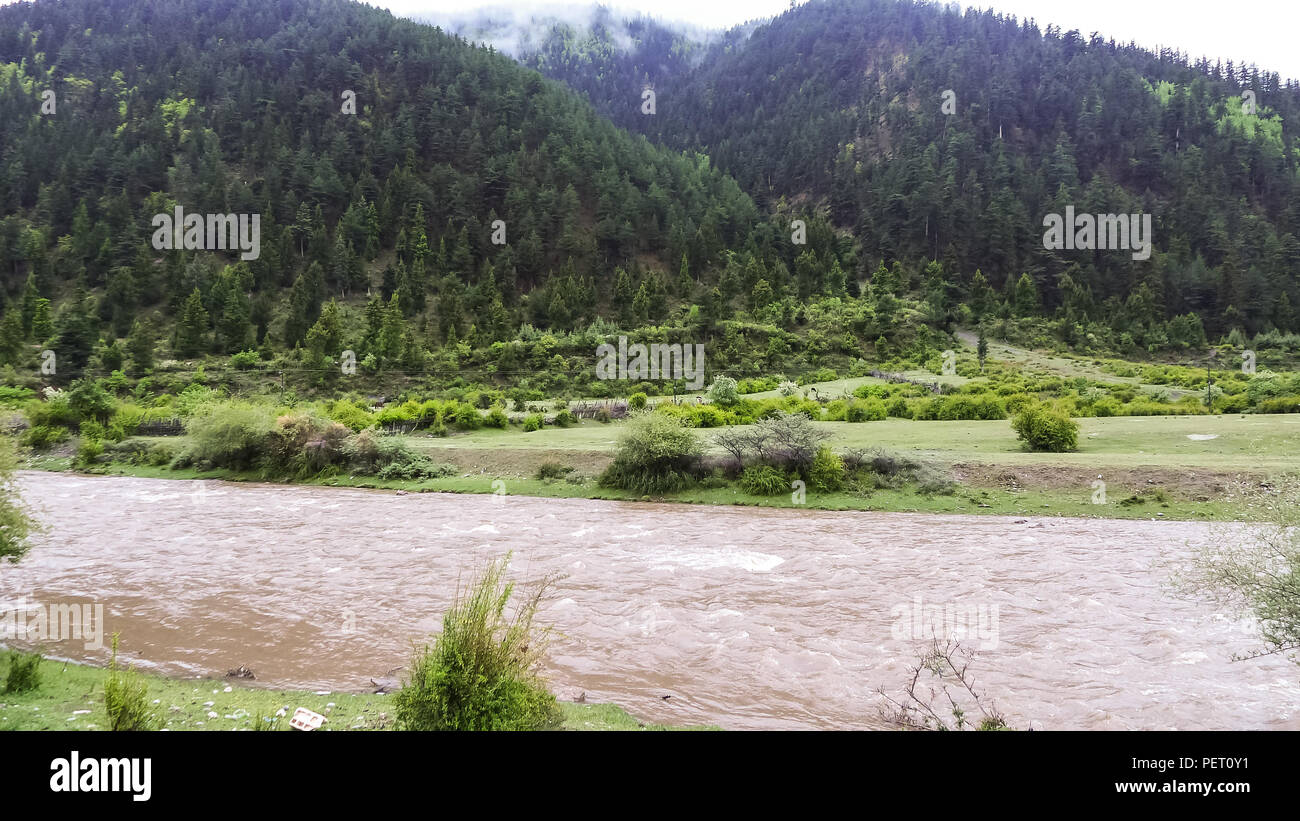 View of Stream,Grassland and Mountains Stock Photo - Alamy