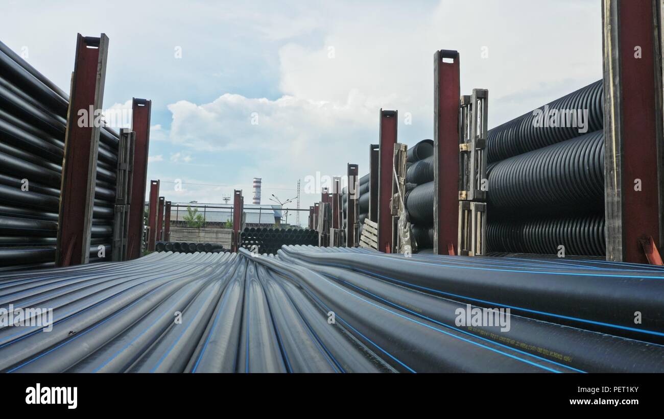 Warehouse of finished plastic pipes industrial outdoors storage site ...