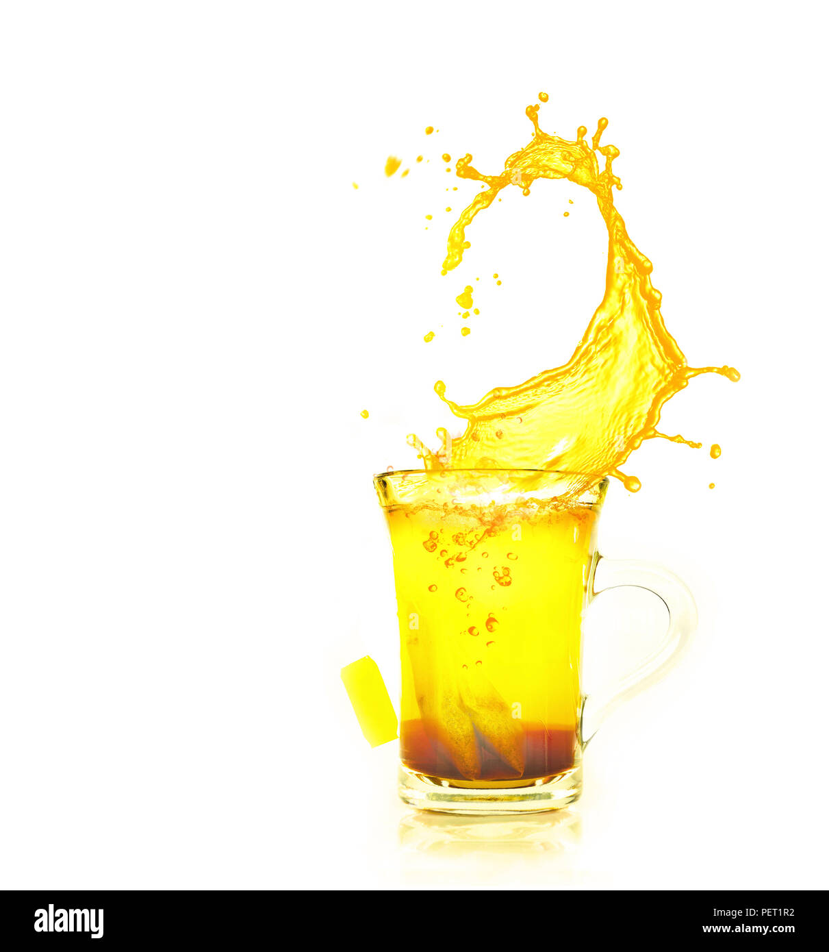 splashing brewing tea on white Stock Photo - Alamy