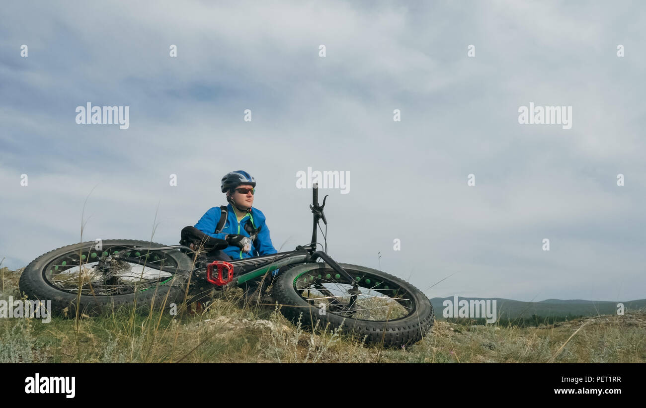 Fat bike also called fatbike or fat-tire bike in summer driving the ...