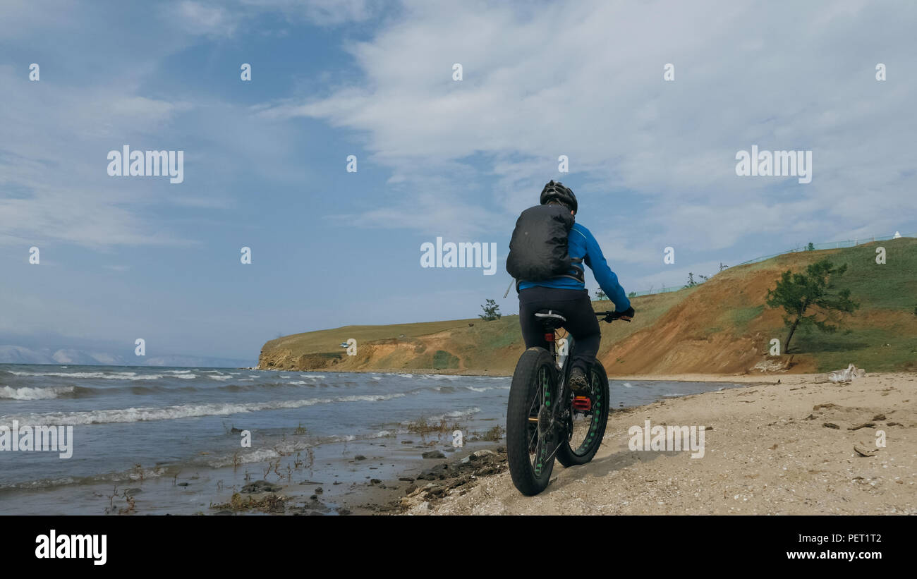 Fat bike also called fatbike or fat-tire bike in summer driving on the ...