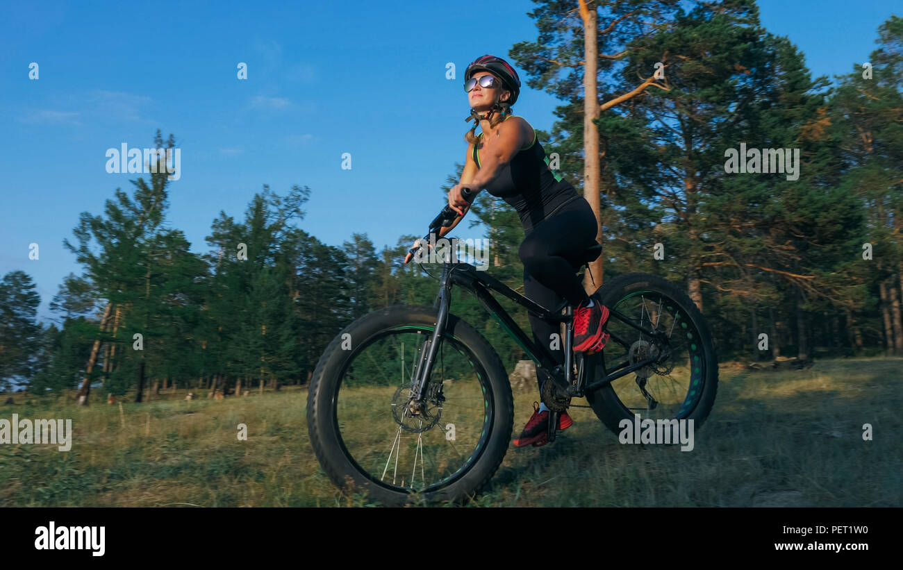 Fat bike also called fatbike or fat-tire bike in summer riding in the ...