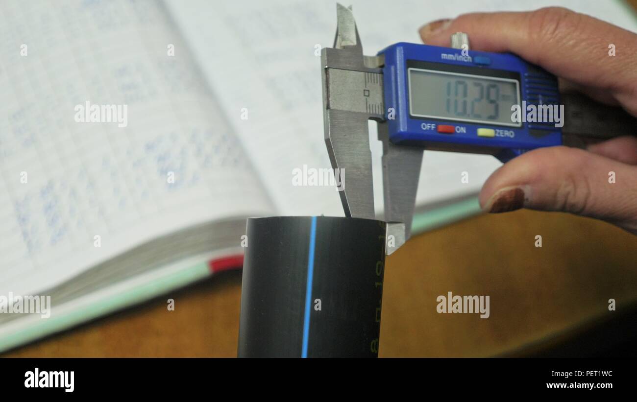 Electronic digital caliper. Manufacture of plastic water pipes factory ...