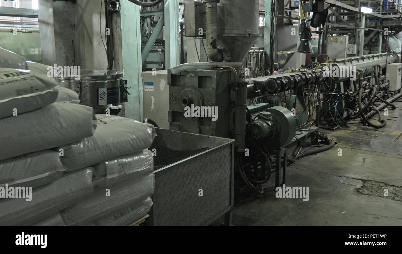 Pipes manufacturing production line. Manufacture of plastic water pipes ...