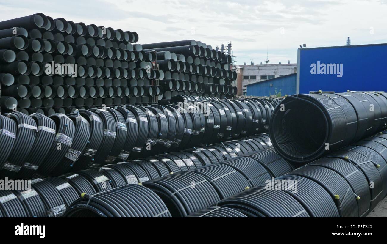 Warehouse of finished plastic pipes industrial outdoors storage site ...