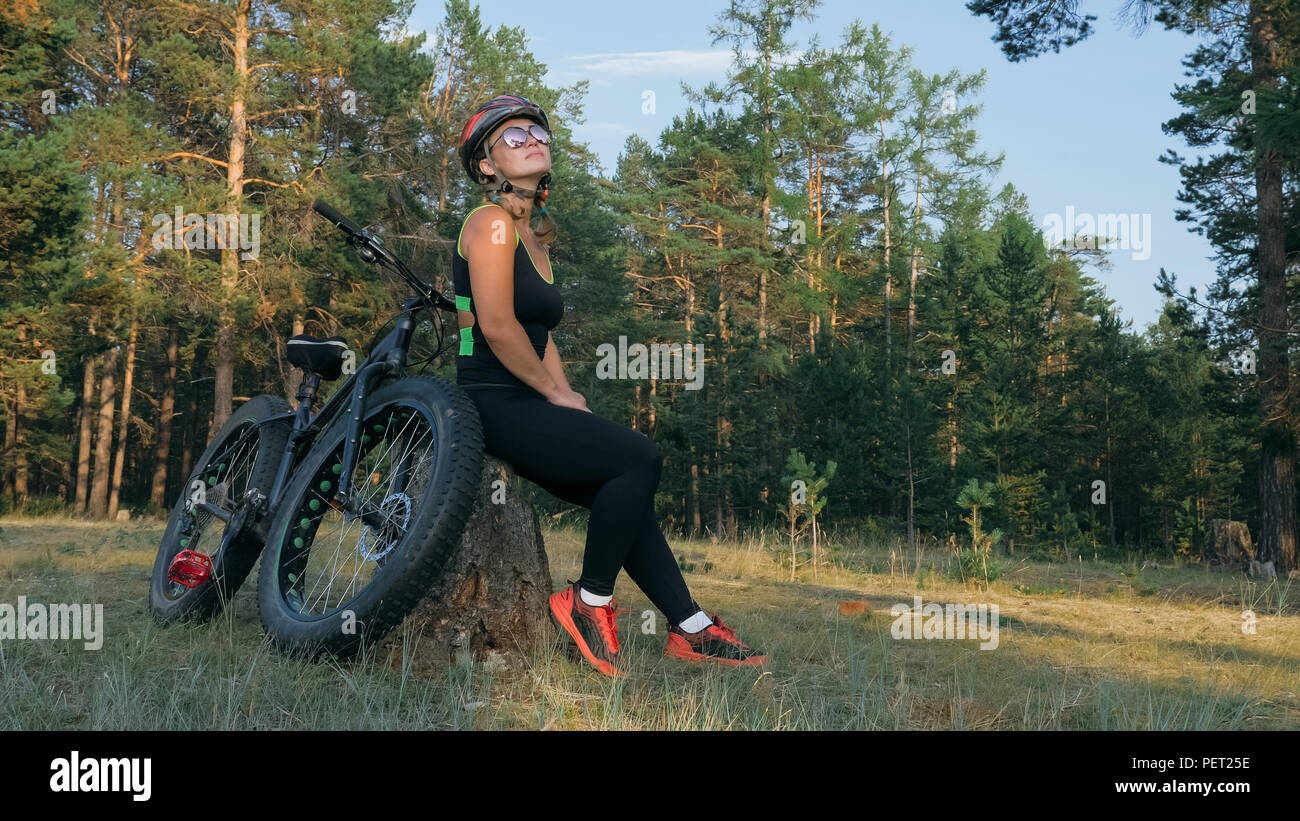 Fat bike also called fatbike or fat-tire bike in summer riding in the ...