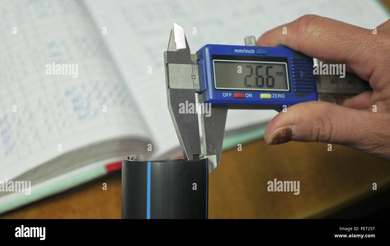 Electronic digital caliper. Manufacture of plastic water pipes factory ...