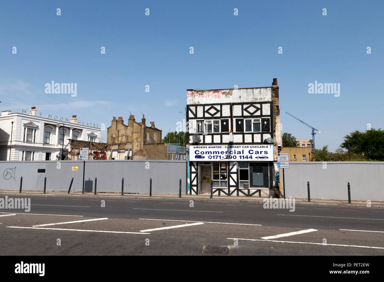 Commercial Cars Taxi office. The last building standing from a terrace ...