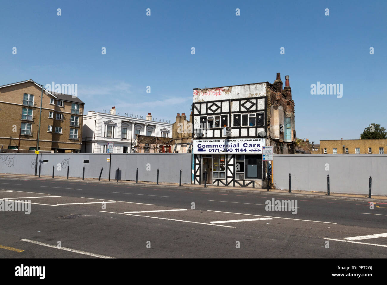 Commercial Cars Taxi office. The last building standing from a terrace ...