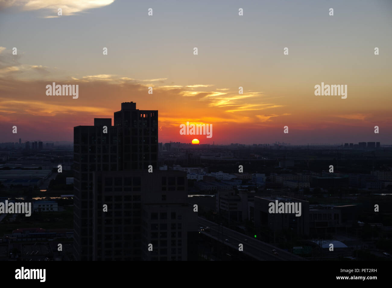 Chinese modern buildings in the sunset Stock Photo - Alamy