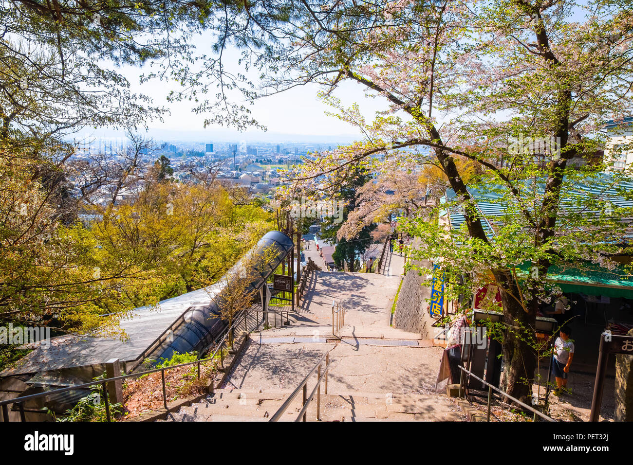AIZUWAKAMATSU, JAPAN - APRIL 21 2018: Way up to The grave site of ...