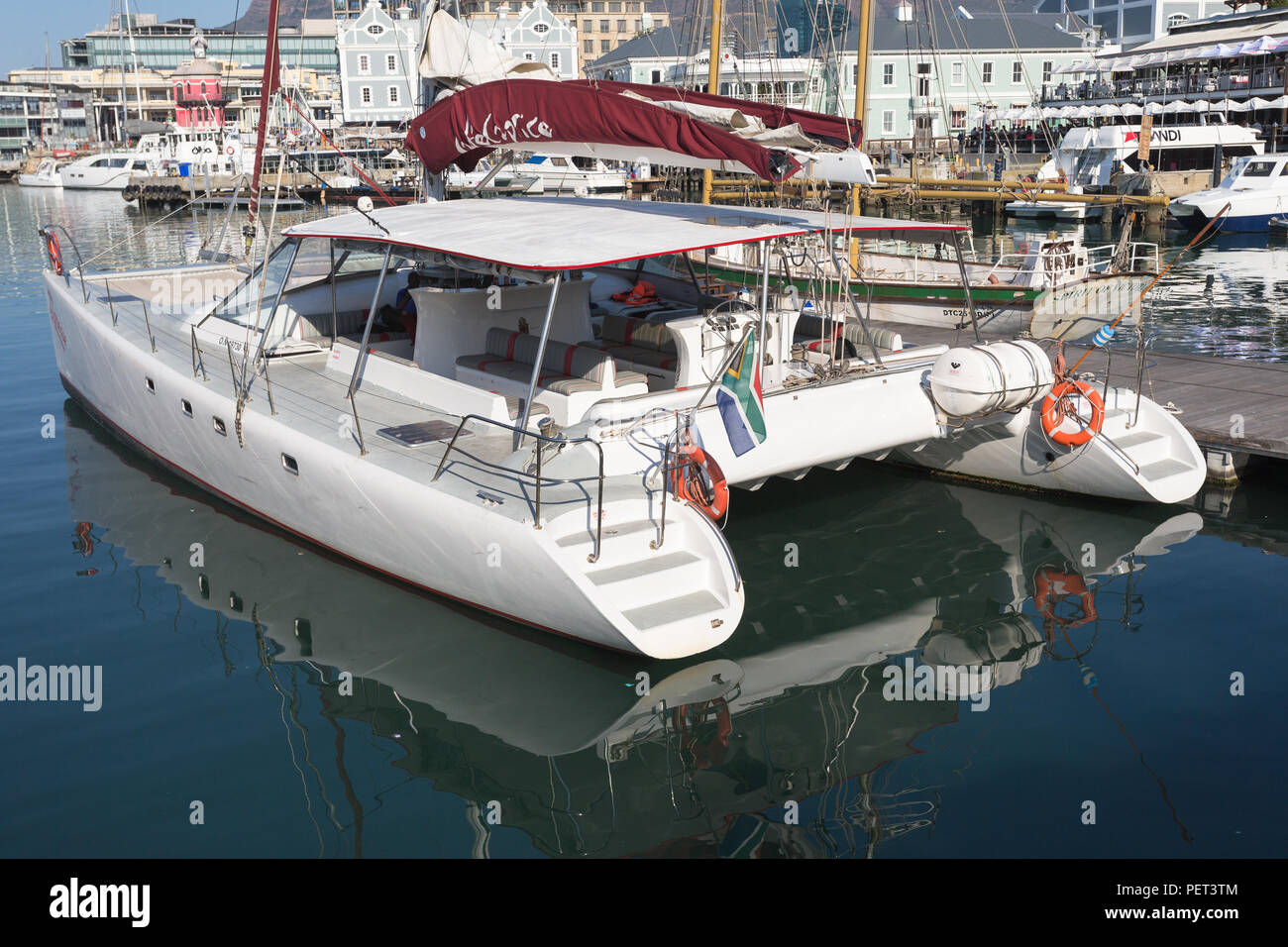 Catamaran moored at a jetty at the V&A Waterfront in Cape Town, South ...