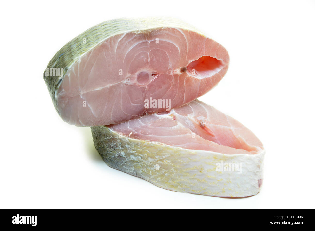 Threadfin fish fillet isolated on white background Stock Photo - Alamy