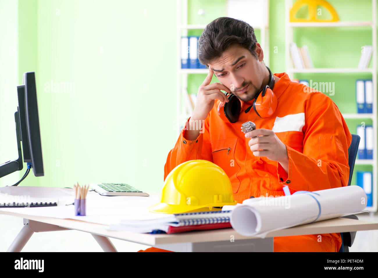 Construction supervisor planning new project in office Stock Photo - Alamy