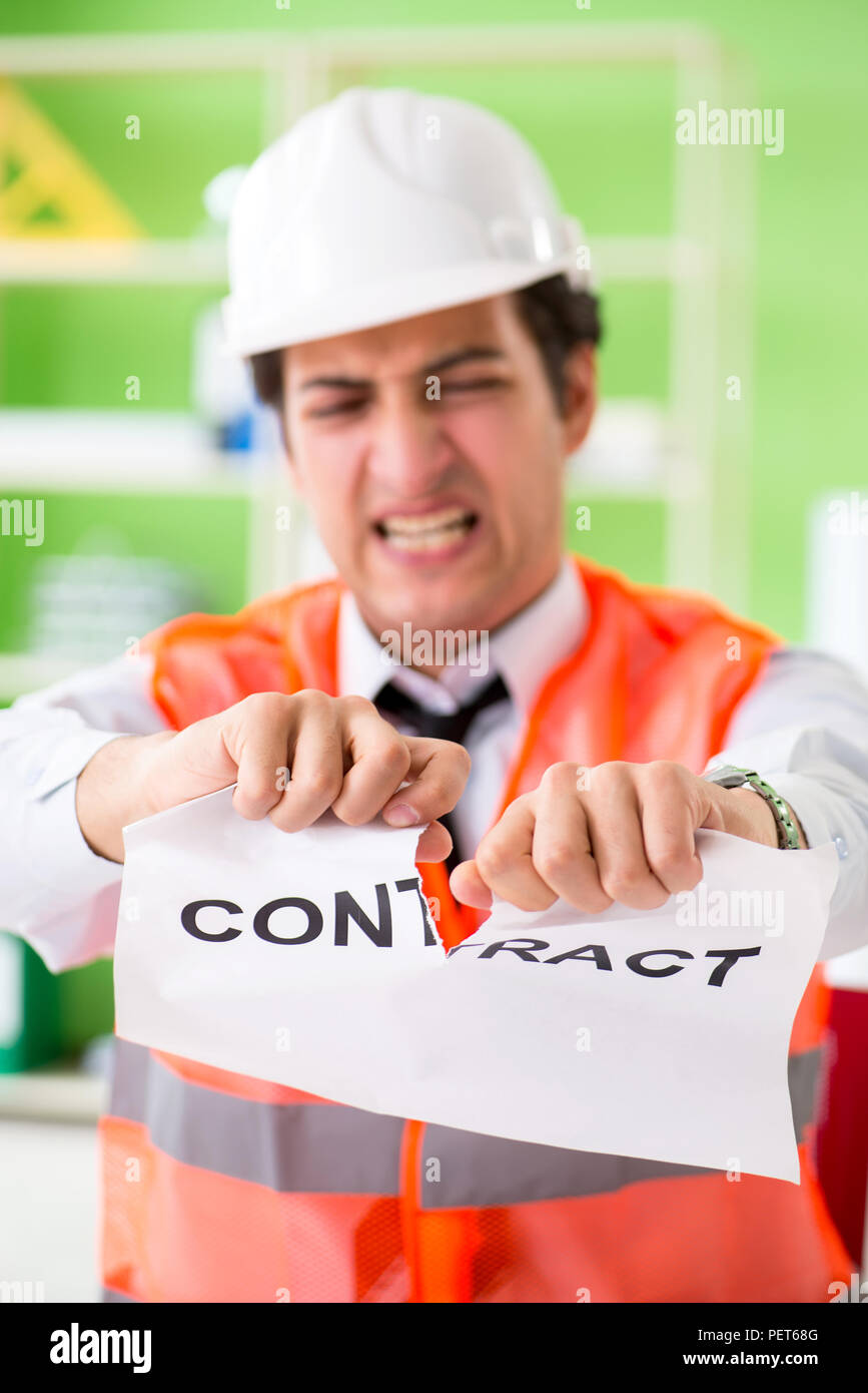 Angry construction supervisor cancelling contract Stock Photo - Alamy